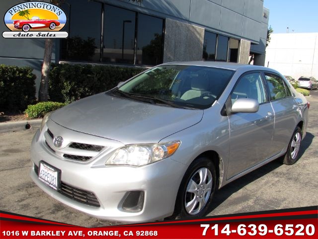 Sold 2011 Toyota Corolla LE in Orange