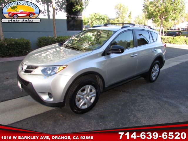 Sold 2014 Toyota RAV4 LE in Orange
